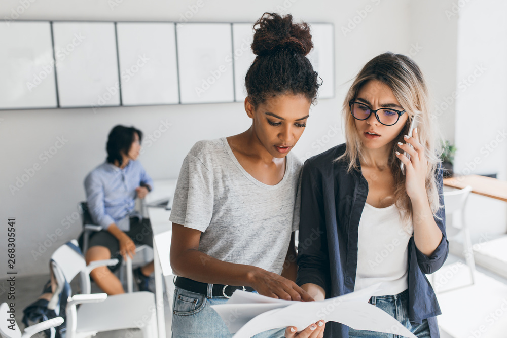 Worried international students waiting for exam in campus and repeating ...