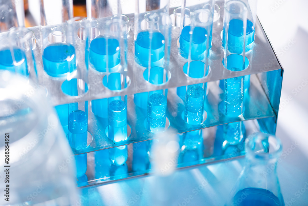 Test tube of glass overflows new liquid solution potassium blue ...