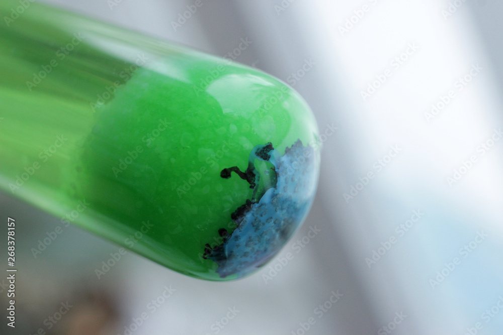 Under a layer of green sediment is copper silicate, whose crystals grow ...