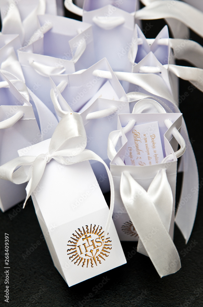First holy communion boxes with thank you notes for guests. Stock Photo ...