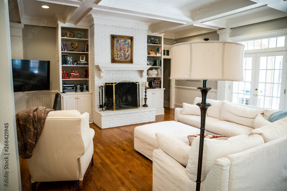 Large Living Room Den in Home with Vaulted Tray Ceiling and bookshelves ...