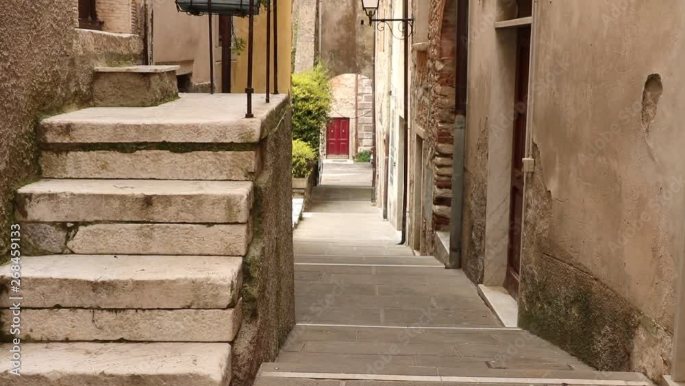 Street of the ancient village of Colonnata, famous for the production ...