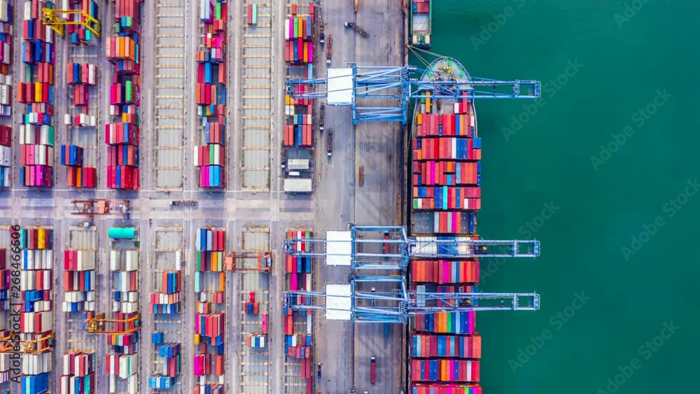 4k, Hyper lapse aerial view container ship loading and unloading in ...