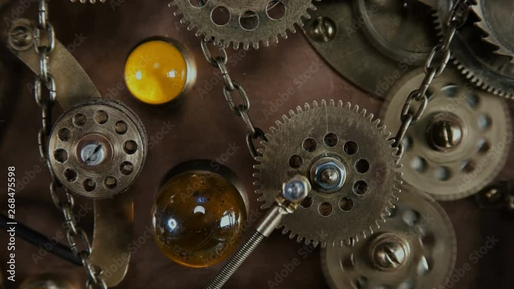 Steampunk, a time machine with rotating gears, a chain, blinking lights ...