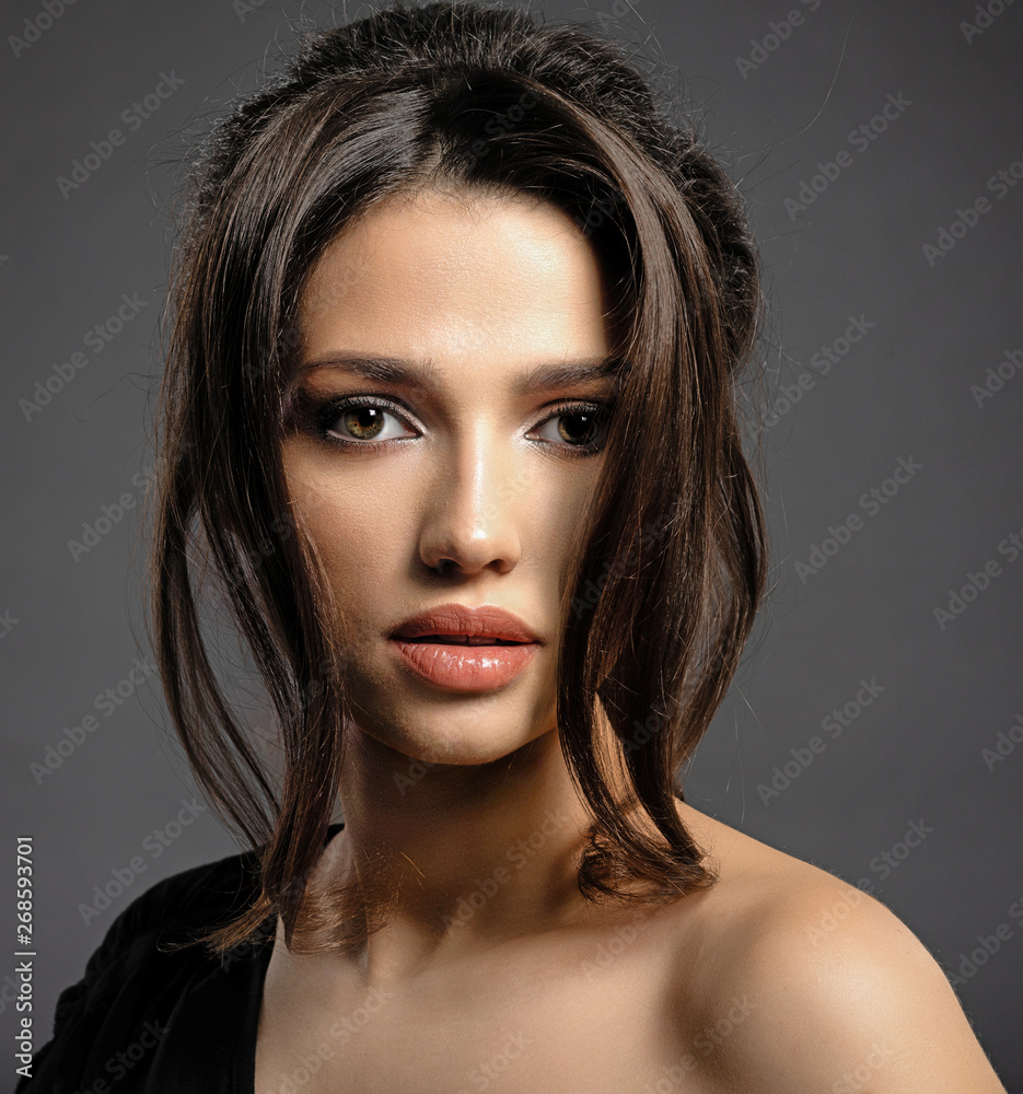Beautiful woman with brown hair. Attractive model with brown eyes ...