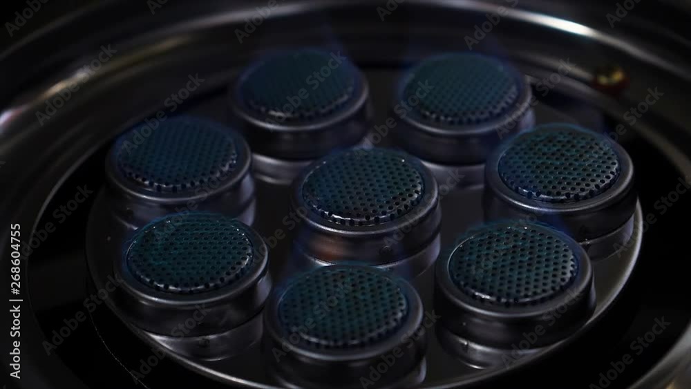 Slow motion Close up shot start ignition to burning fire on gas stove ...