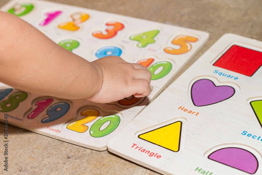 Little girl with toy numbers educational games at home, Board games for ...