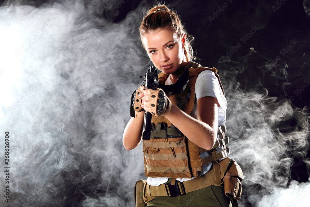 woman sniper in body armour with SVD sniper rifle. Female serving in ...