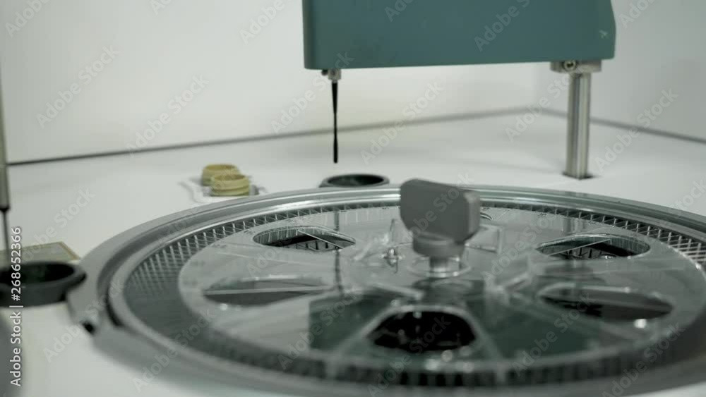 Automated spectrograph analyzer spin and inspecting urine and blood ...