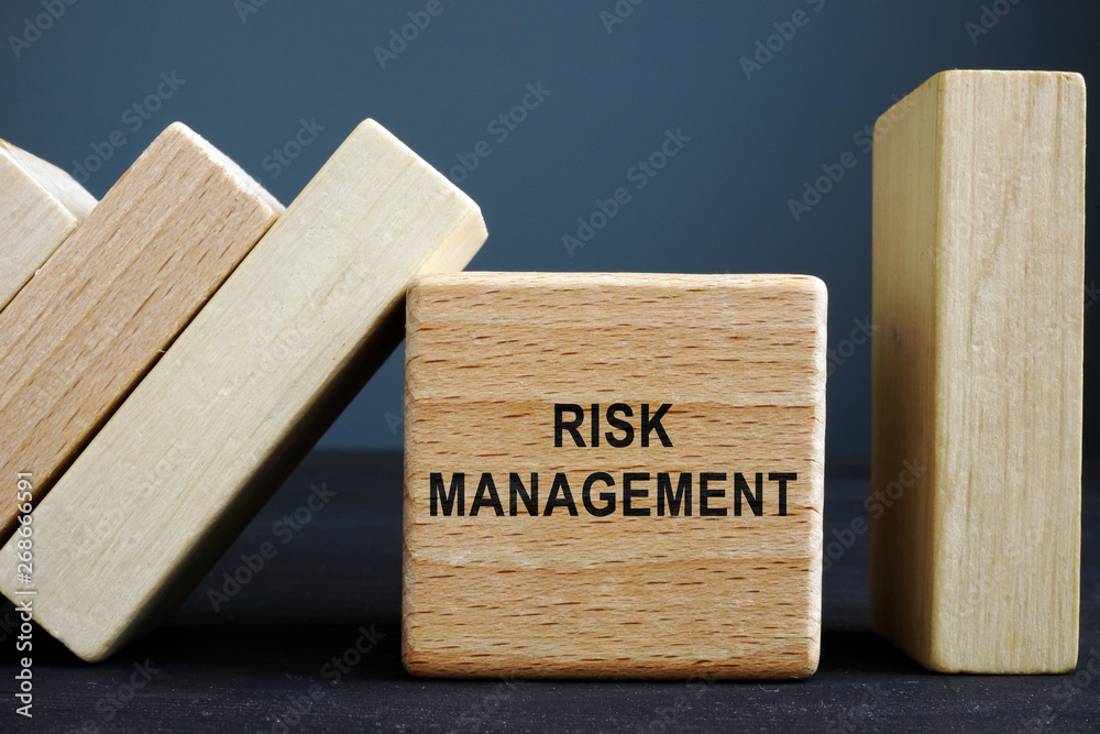 Risk management concept. Wooden cube and bricks with domino effect ...