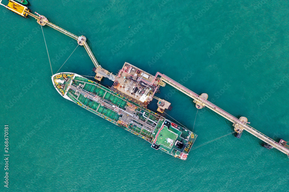 Aerial top view of the ship carrying the lpg and oil tanker in the sea ...