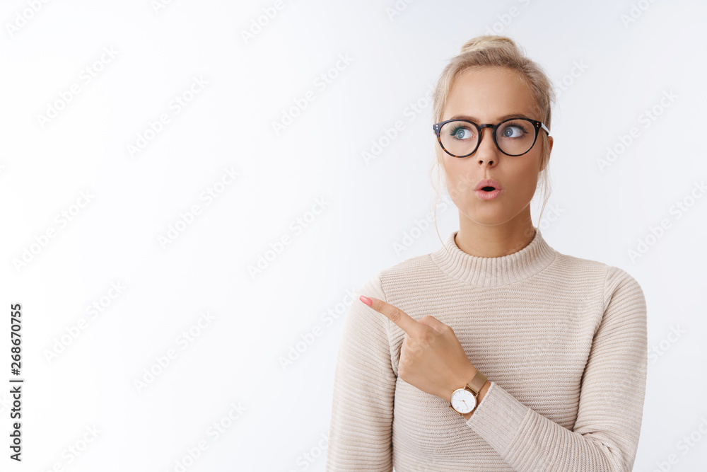 Wow amazing. Portrait of amused and surprised creative young female ...