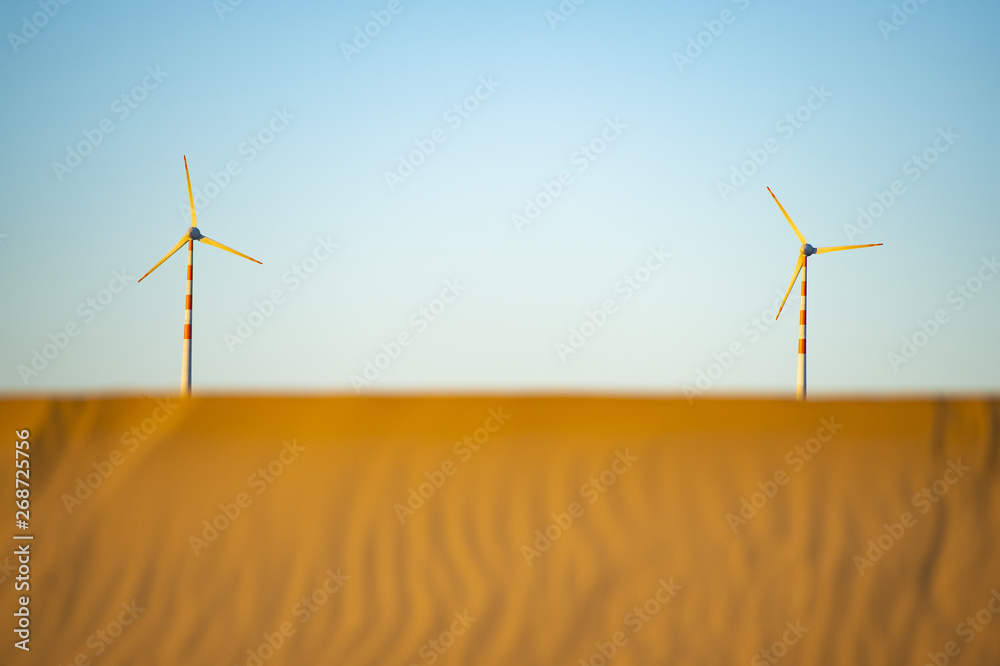 (Selective focus) Wind turbines in the middle of the Thar Desert during ...