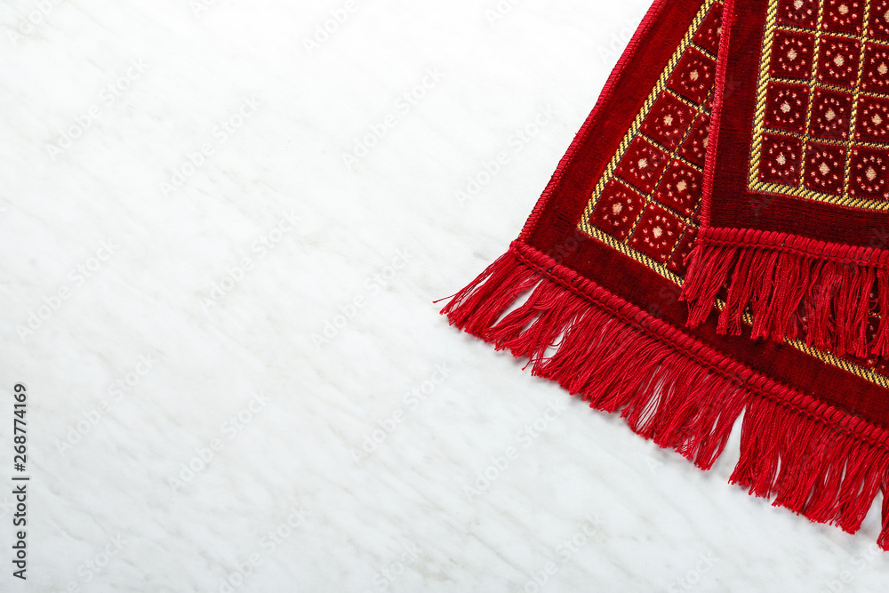 Muslim prayer rug on white background Stock Photo | Adobe Stock