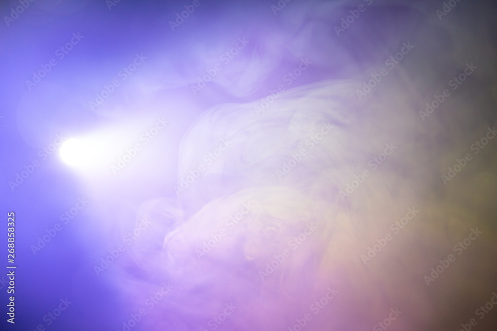 projector spotlight purple color , smoke abstract texture background ...