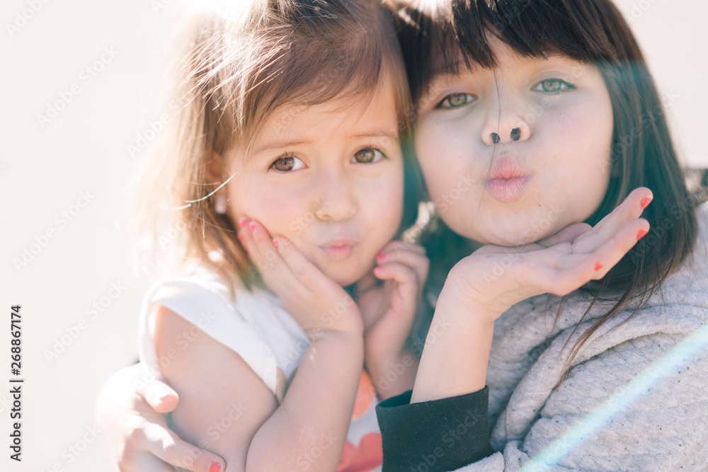 Girls puckering their lips Stock Photo | Adobe Stock