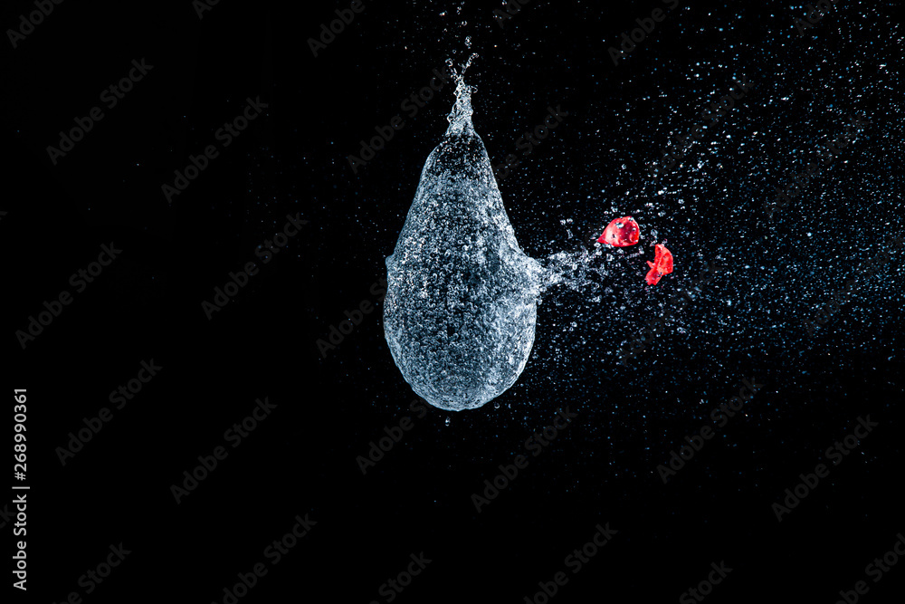 Balloon filled water bursting . Bomb water balloon with fantastic water ...