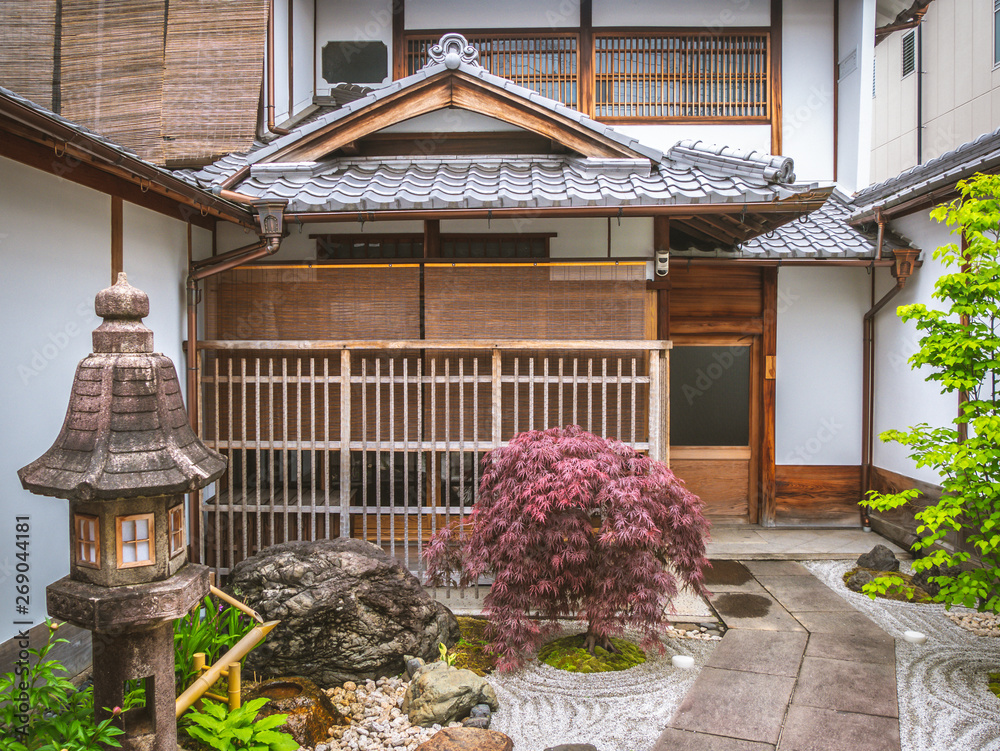 An entrance to a japanese traditional hotel. Sliding doors at a ryokan ...
