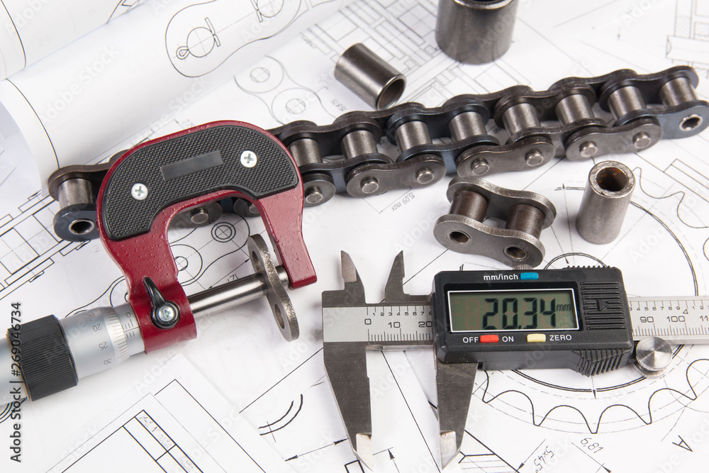 Driving roller chain, caliper and micrometer on engineering drawings ...