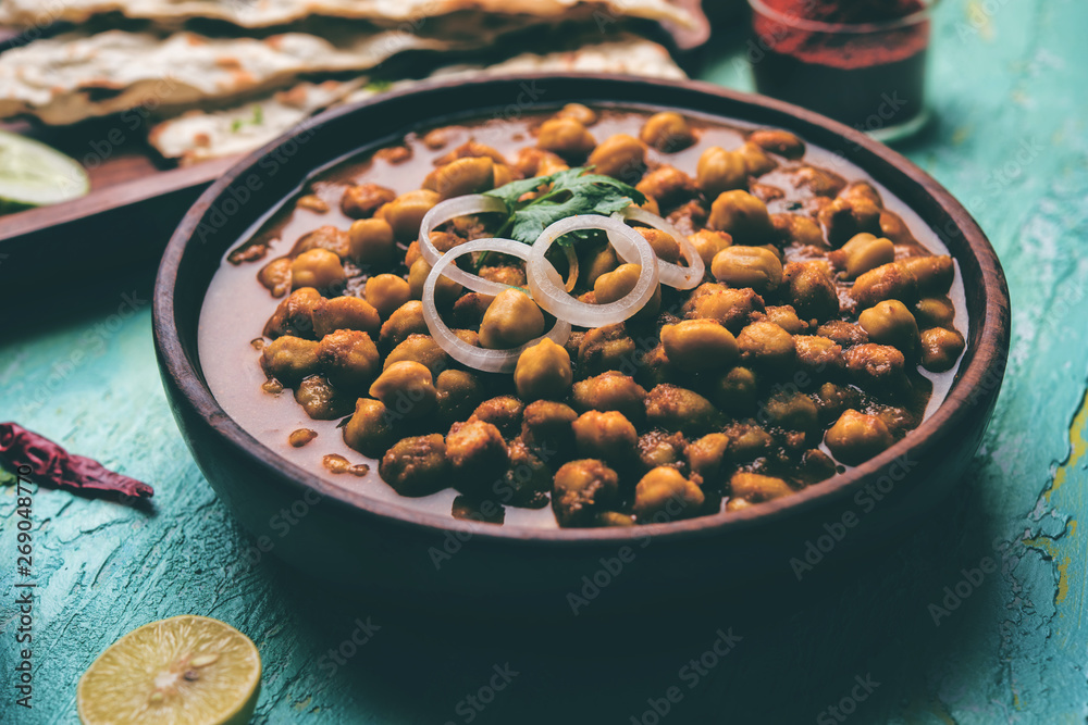 Chola / Chole or Choley Curry with Naan and rice Stock Photo | Adobe Stock