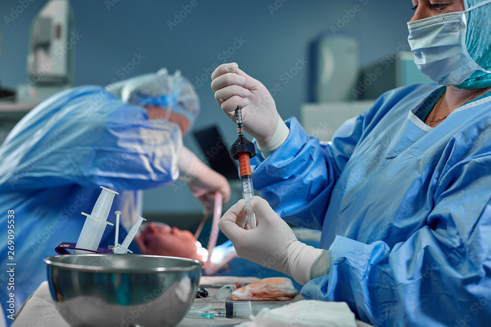 Hands Holding Syringe and Transfer Fat with Nano Fat Transfer Tool in ...