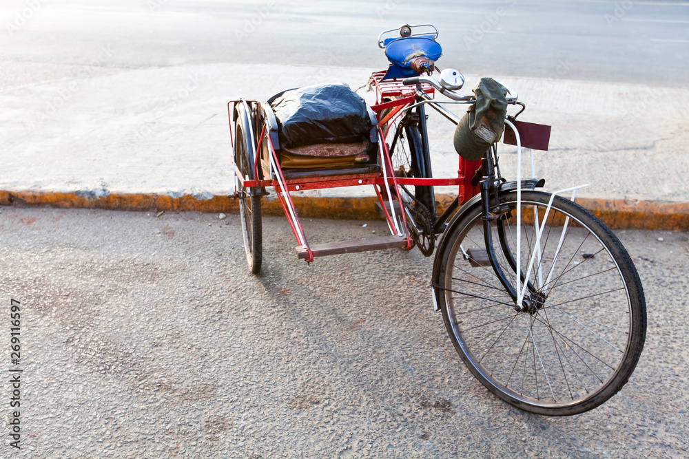 Modified traditional tricycle for tourists and local passengers in ...