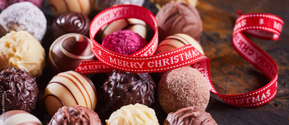 Merry Christmas gourmet handmade chocolates Stock Photo | Adobe Stock