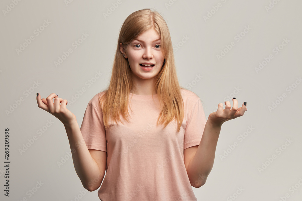 attractive excited girl explaining something with gestures. talking ...