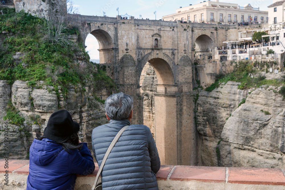 The couple admires the sights of the Spanish city of Ronda. The famous ...