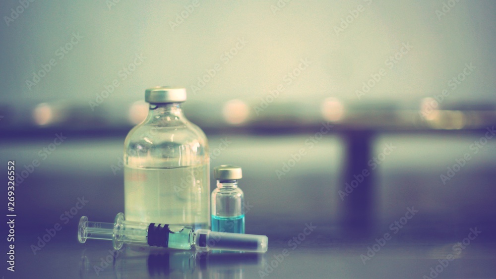Vaccine vial dose flu shot drug needle syringe,medical concept ...