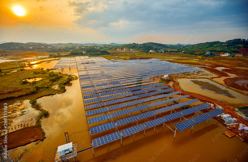 Aerial photography of solar photovoltaic panels built on the water ...