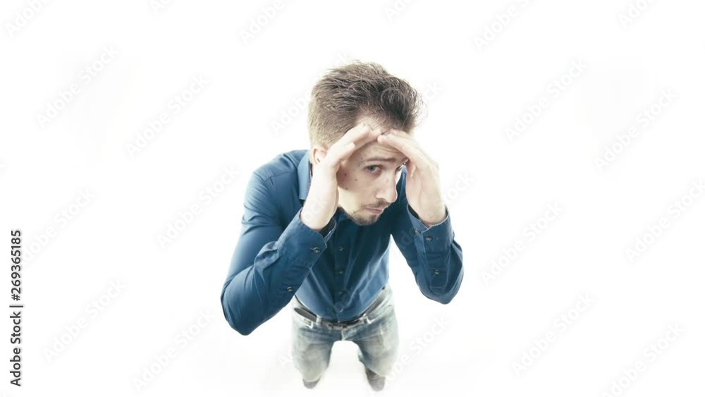 Man afraid to give eye contact 4K. Extreme wide shot top view of male ...