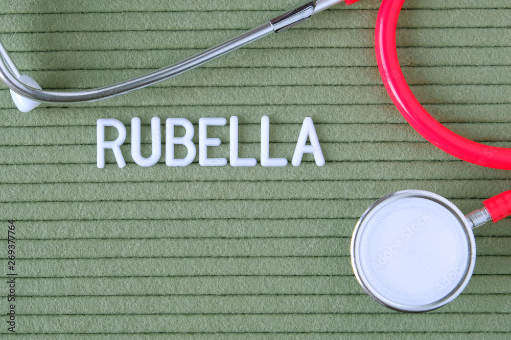 Rubella - text of white letters on a green background with a ...