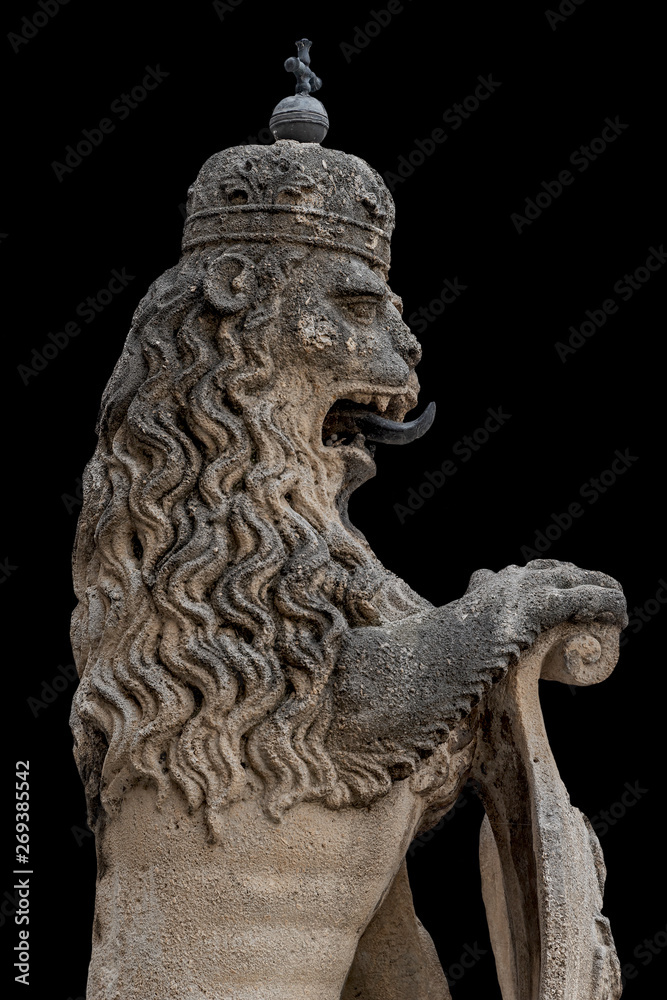 Old statute of powerful lion with royal crown in downtown of Vienna ...