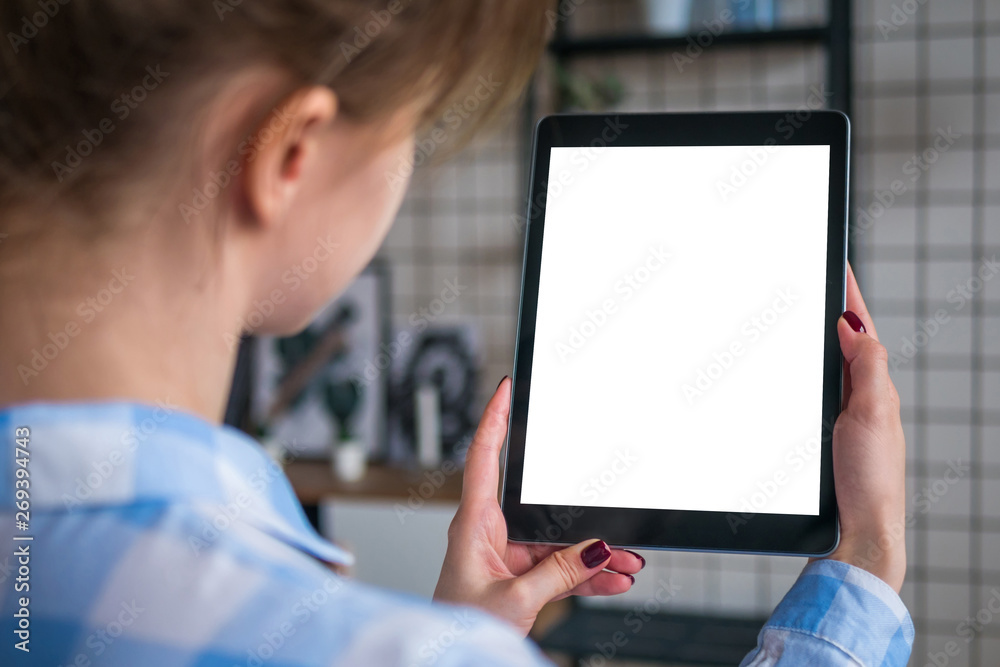 Over shoulder closeup view: woman hands holding digital tablet computer ...