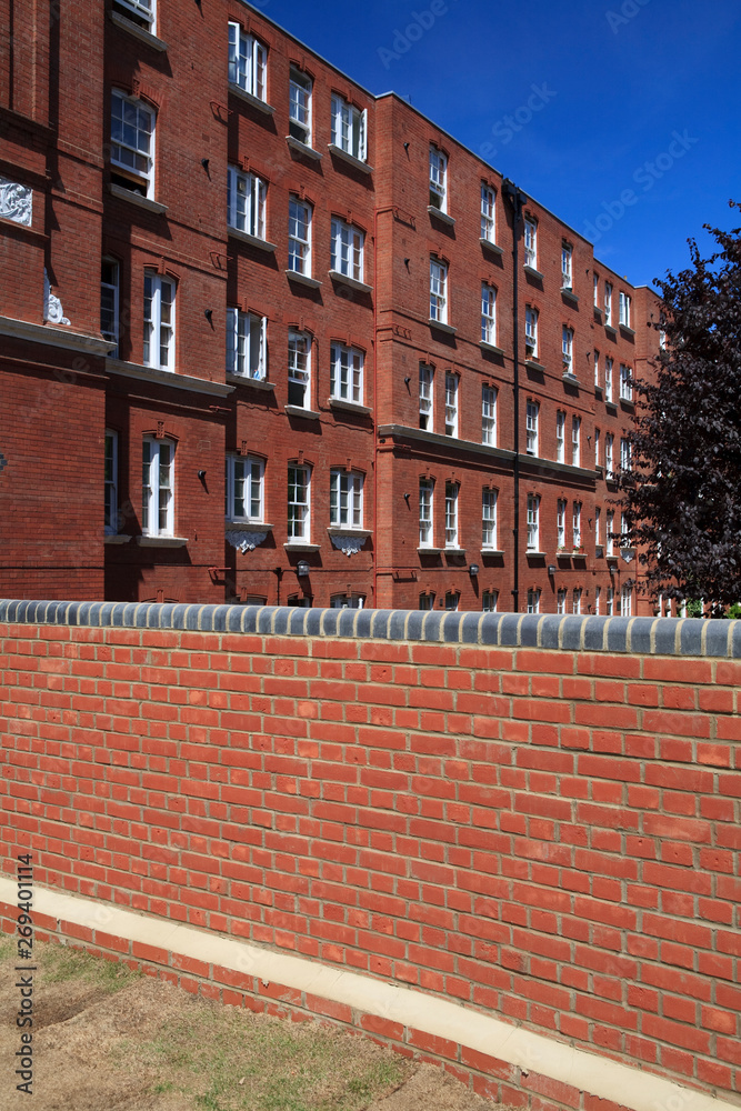 Traditional brick Victorian tenement flats in a housing estate Stock ...