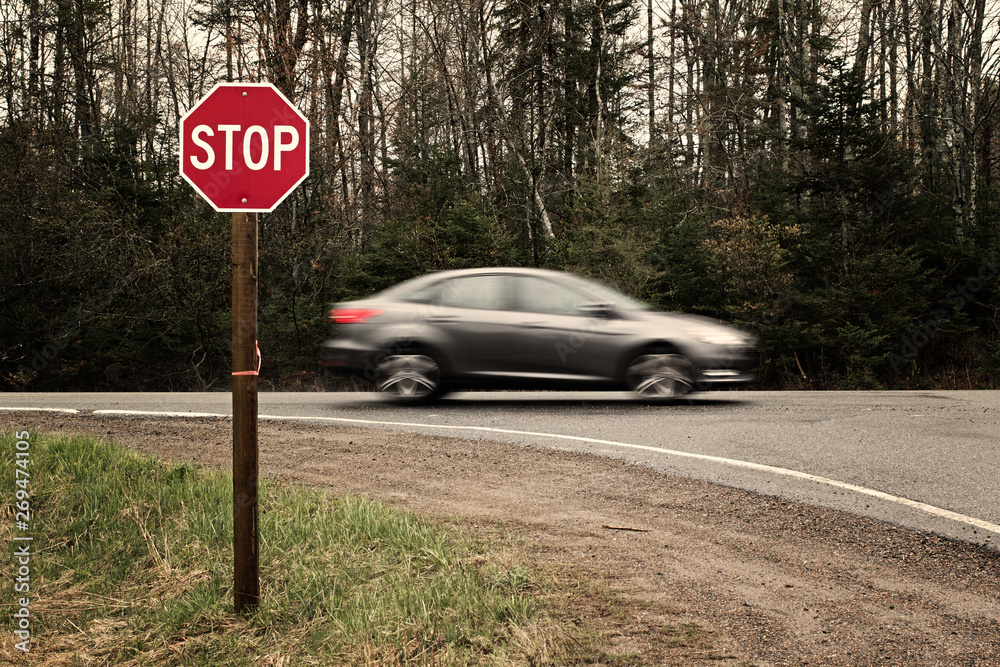 Stop sign and blurred car. Accident concept. Stock Photo | Adobe Stock
