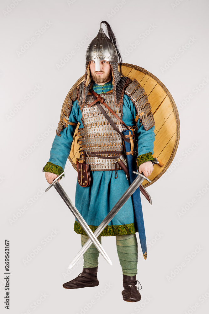 medieval soldier with helmet, hauberks, sword and shields isolated on ...