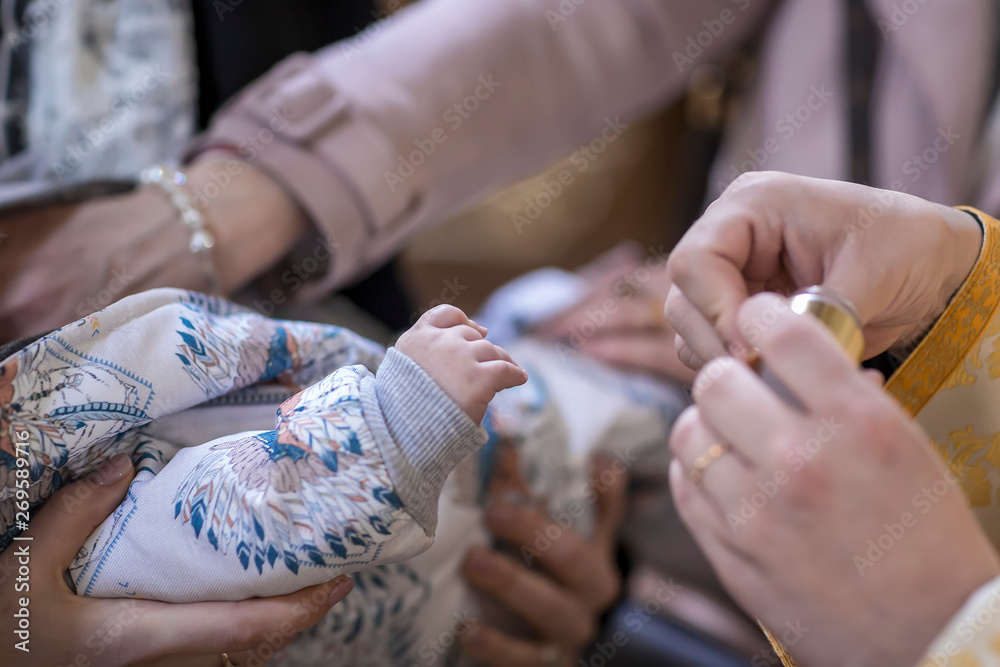 baby preparing for a baptismal ceremony, The sacrament of baptism ...
