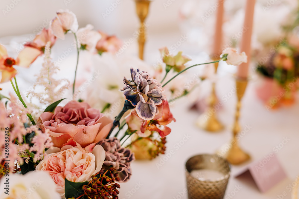 Wedding decoration table in the hall, floral arrangement. In the style ...