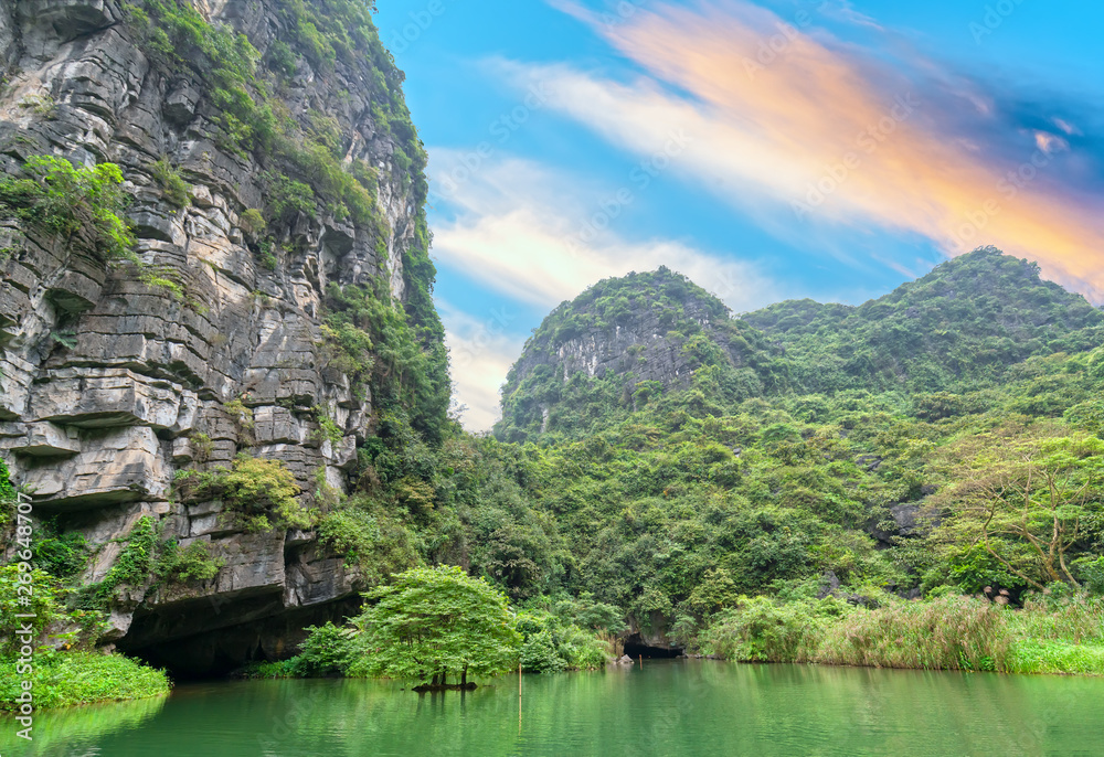 The scenic landscape of limestone mountains at Tam Coc National Park ...