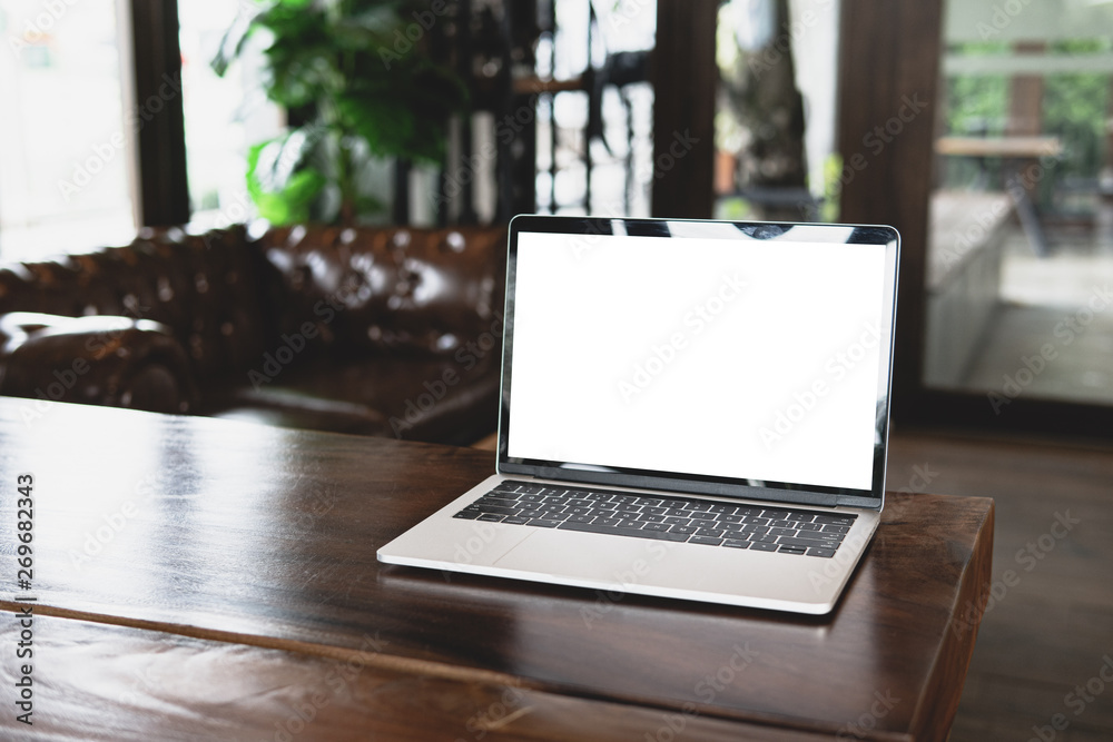 Blank screen laptop on table template.Laptop computer white screen for ...