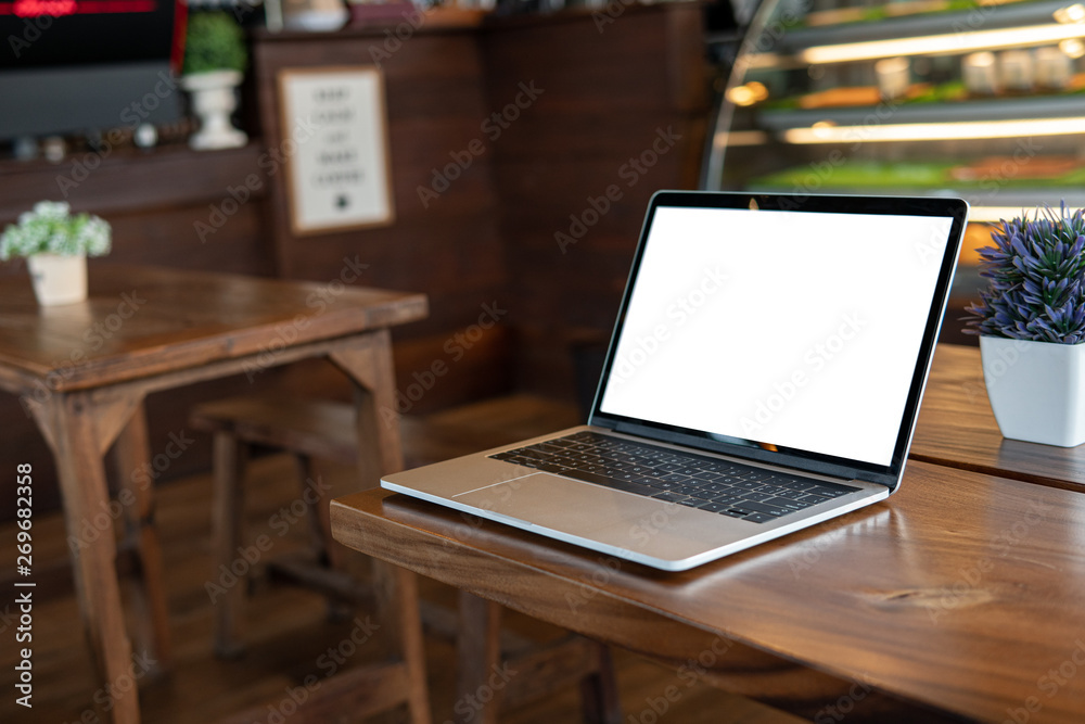 Blank screen laptop on table template.Laptop computer white screen for ...