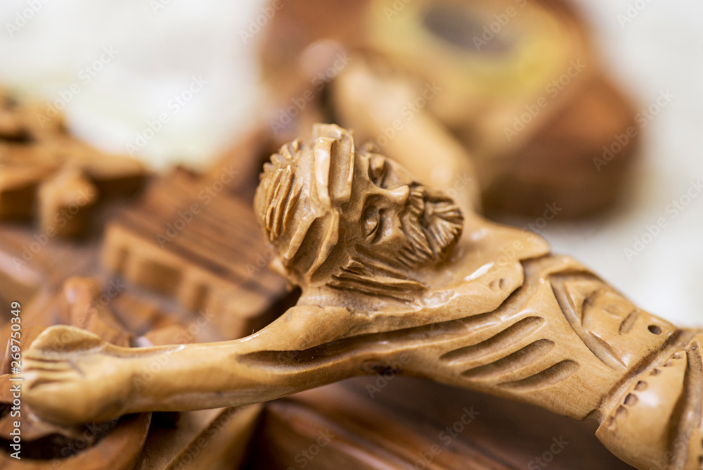 Jesus on the cross in church. Wooden cross with Jesus Christ ...