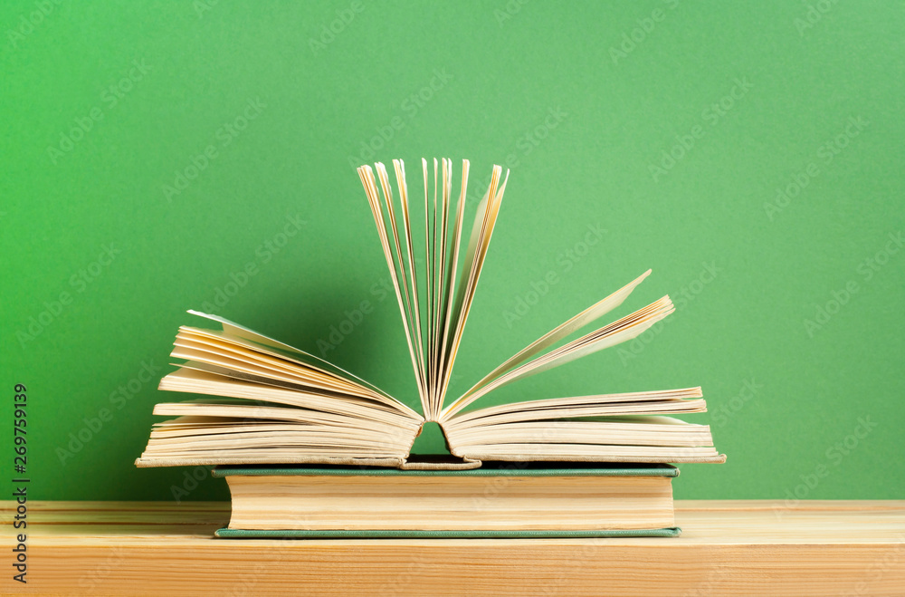 Open book on wooden table. Education background. Back to school. Stock ...