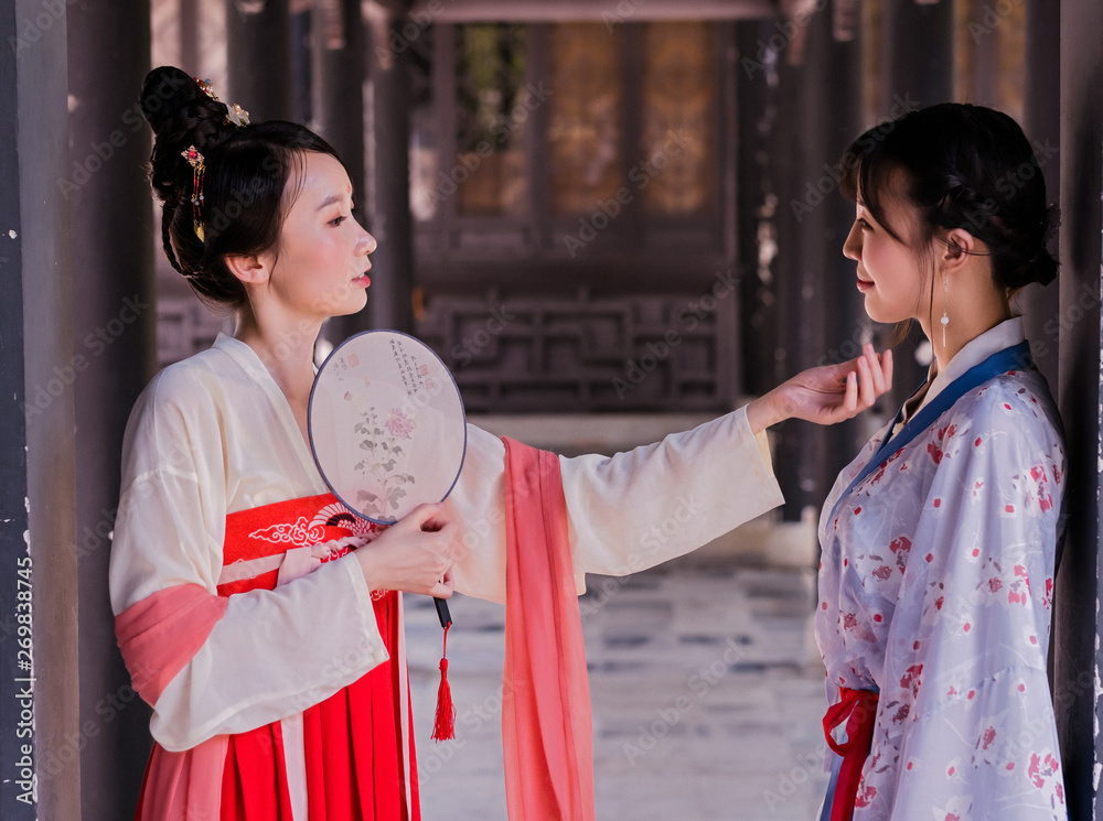 Two young women wearing in Chinese Han clothing in traditional Chinese ...