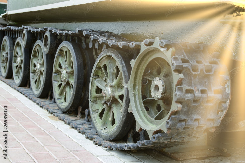 Military stile. Detail shot with old tank tracks and wheels Stock Photo ...