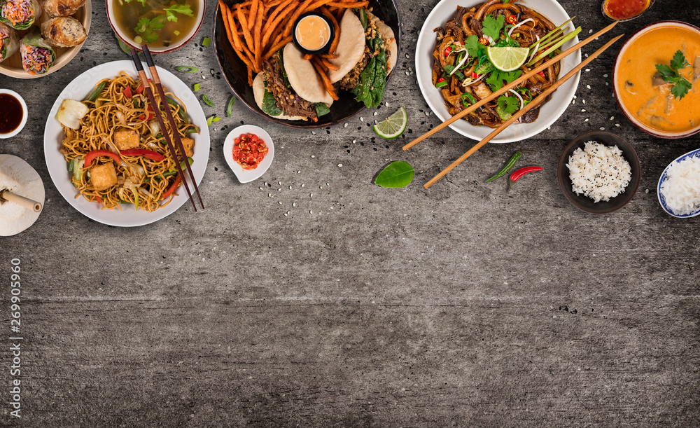 Asian food background with various ingredients on rustic stone ...