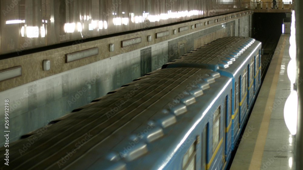 Subway train at station, top view. Subway train in motion arriving at ...