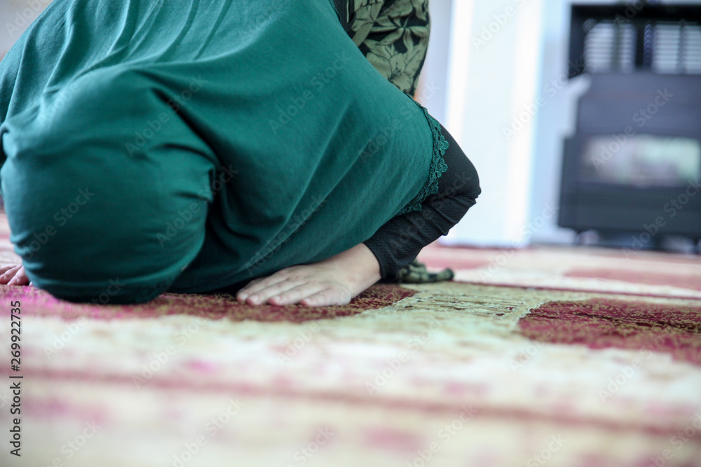 Young Muslim woman praying,in the mosque Stock Photo | Adobe Stock